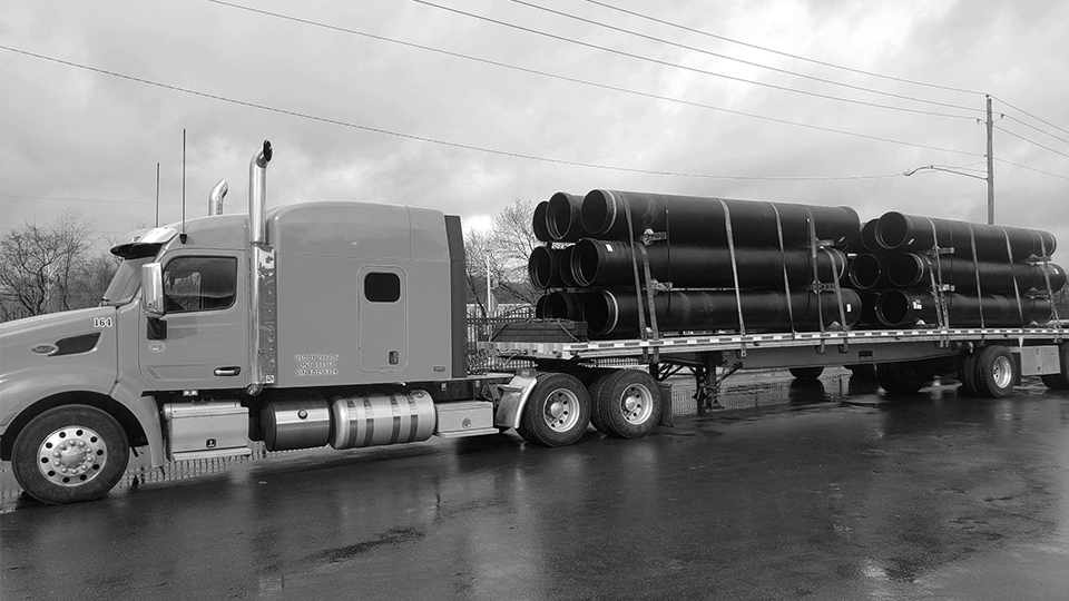 What Does Flatbed Shipping Cost? [8 Factors To Know]