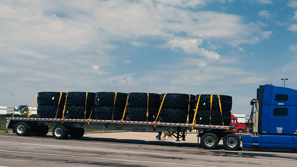 How Much Weight Can I Ship On a Flatbed Trailer? Kingpin Laws Overview